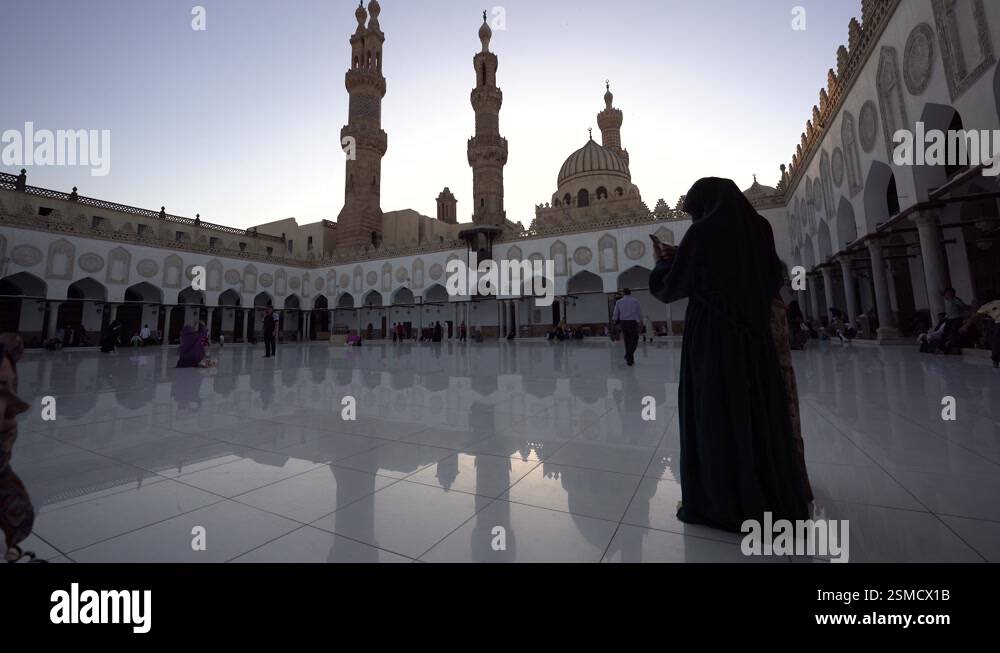 People On White Marble-Paved Courtyard On Al-Azhar Mosque At Dusk In ...