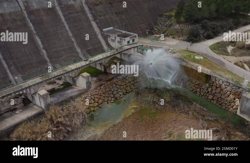 Dam relief at its base operating at full capacity with high pressure ...