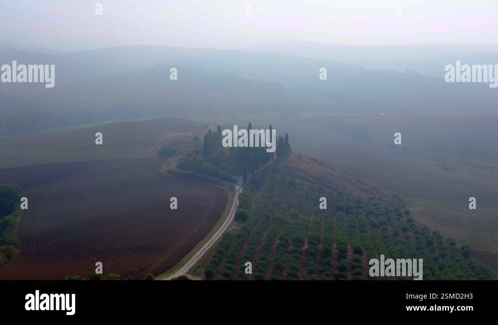 Nice aerial top view flight morning fog Landscape Tuscany mist valley ...