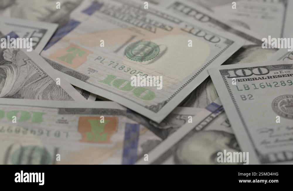 Closeup slide background of 100 dollar bills new style Stock Video ...