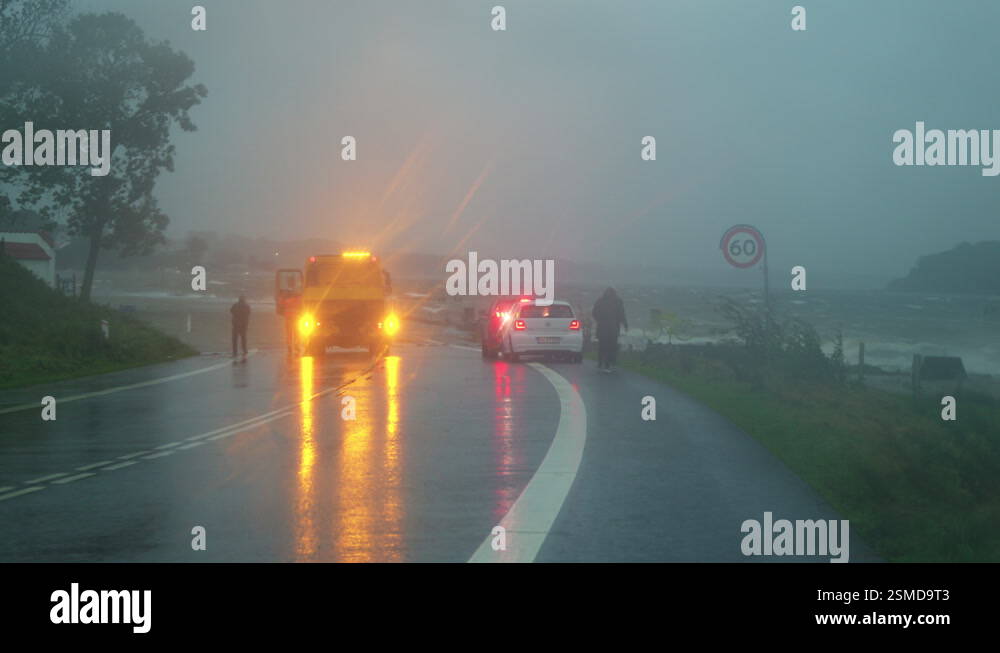 Emergency response to storm surge in Kollund, with vehicles and ...