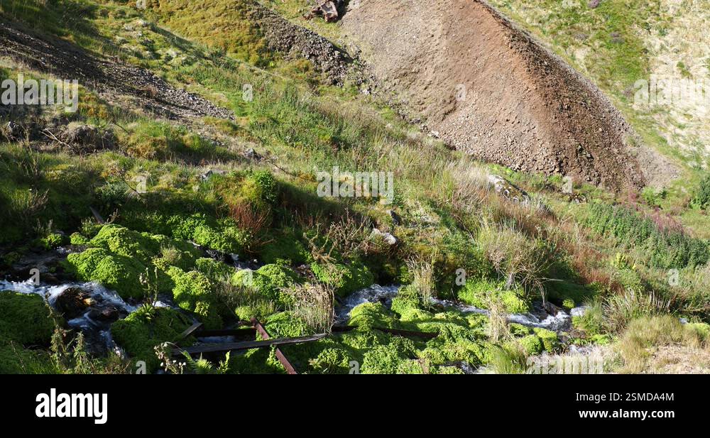 Water emerging from Potts Gill Mine below High Pike in the Caldbeck ...