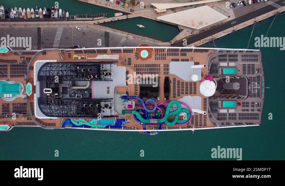 Overhead Aerial of Swimming Pool Slides and Sunbeds on Big Luxury ...