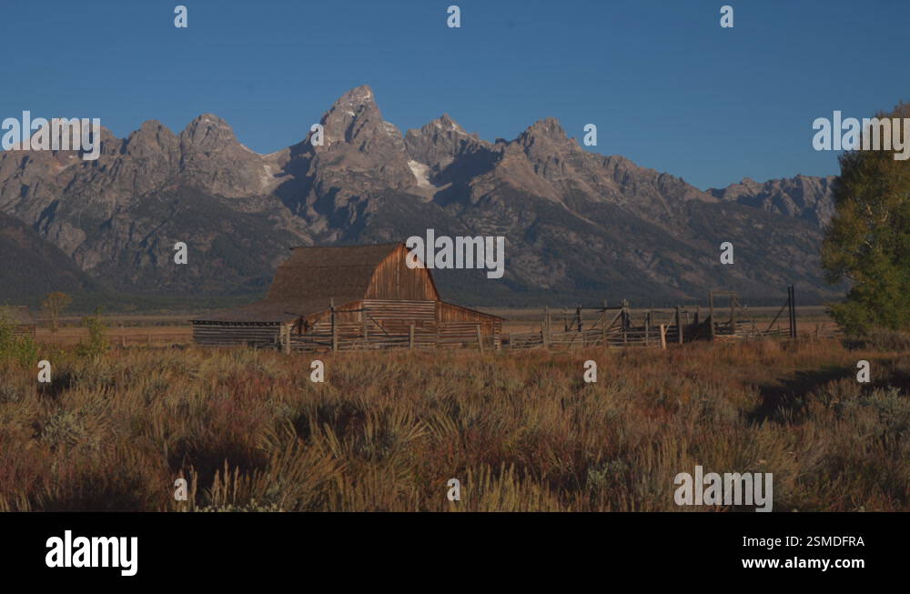 Cinematic slider left slowly Mormon Row Historic district first light ...