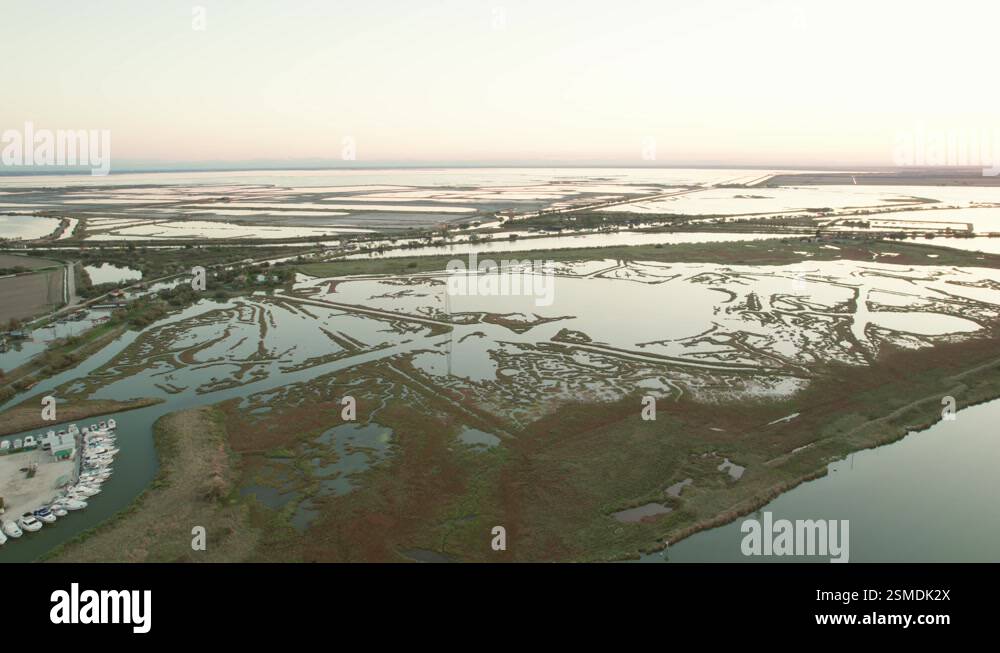 The Valli di Comacchio lagoon and wetland, drone orbit view during day ...