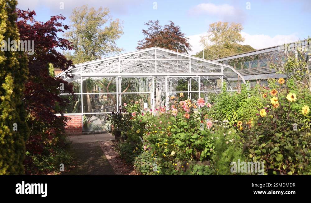 green house and colorful gardens at the botanic gardens in Inverness ...