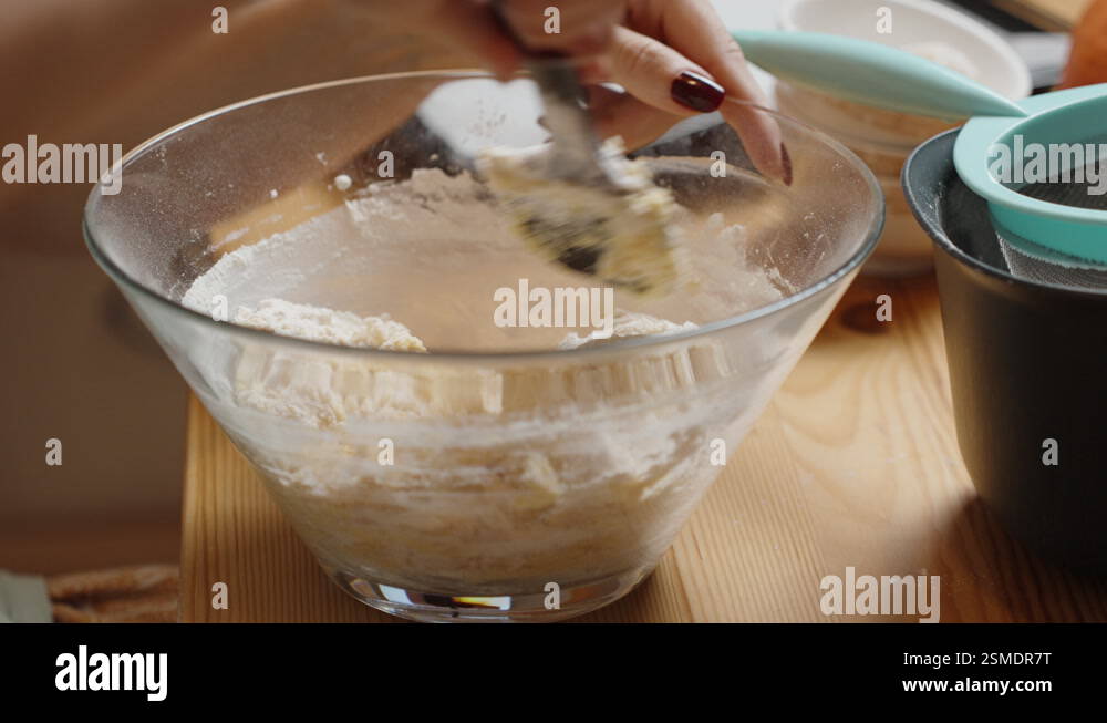 Woman stirs the dough in the bowl with a spatula Stock Video Footage ...