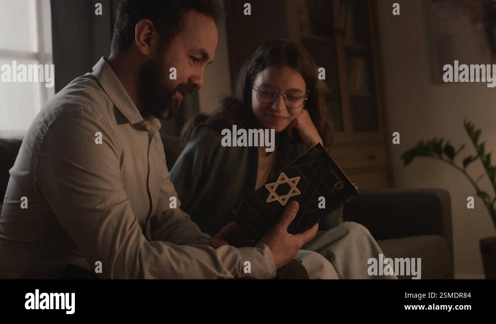 Jewish Man in Kippah Reading Torah with Daughter on Shabbat Stock Video ...