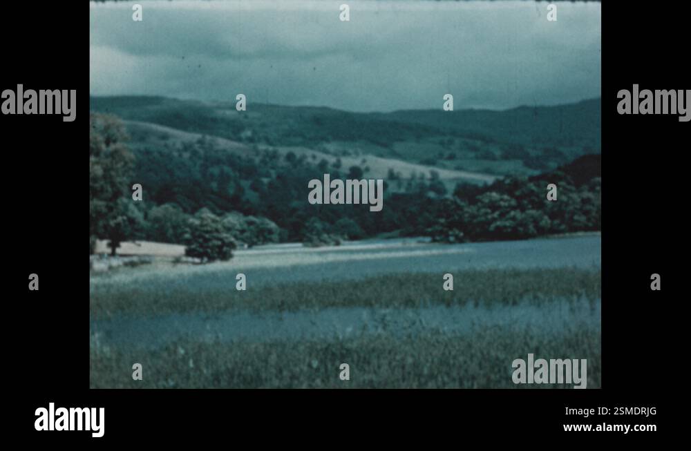 1960s: Views of the rolling hills of the English countryside. Stream ...