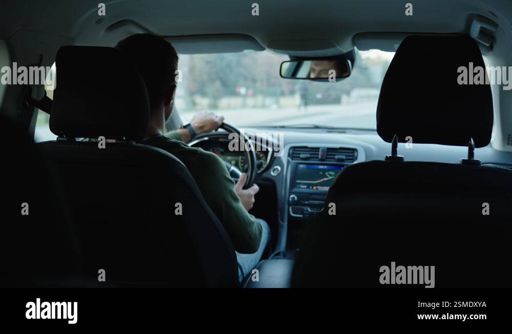 Male driver driving car, inside view Stock Video Footage - Alamy