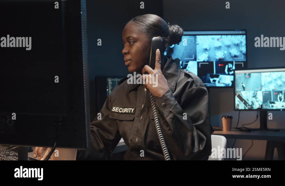 Security Guard Answering Work Call During Workday Stock Video Footage ...