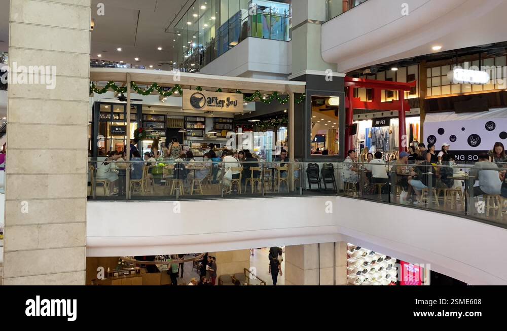 People sitting inside After you dessert shop at the mall. Editorial ...