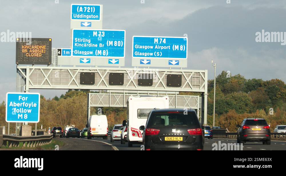 A motor home and other traffic on the motorway near Glasgow, Scotland ...