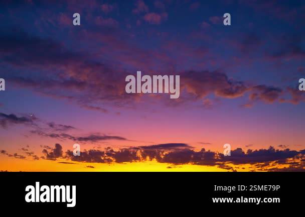 Twilight Sky timelapse. Moving clouds and sunset. Clouds float through ...