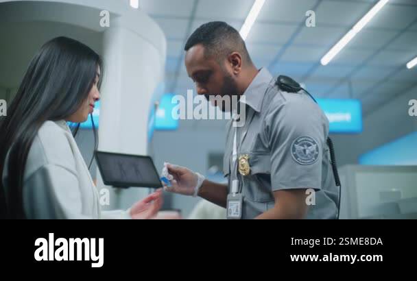 Airport Terminal: African American Security Officer Conducts TSA Hand ...