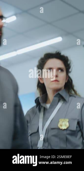 Security Checkpoint in Airport: African American Security Officer ...