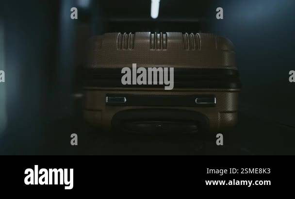 Security Checkpoint in Airport Terminal: Close Up of Suitcase Moving on ...