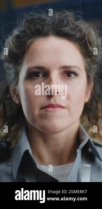 Portrait of Female Security Officer Looking at Camera. TSA Worker in ...