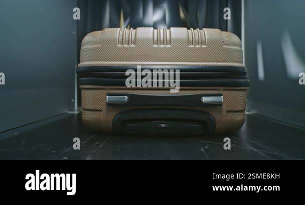 Security Checkpoint in Airport Terminal: Close Up of Passenger Suitcase ...