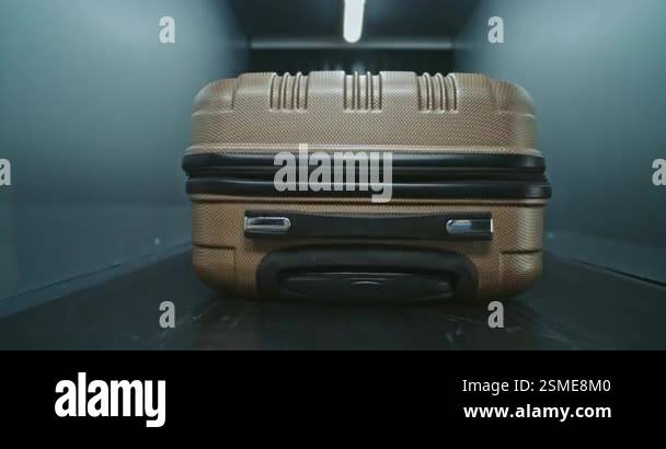 Security Checkpoint in Airport Terminal: Close Up of Suitcase Moving on ...