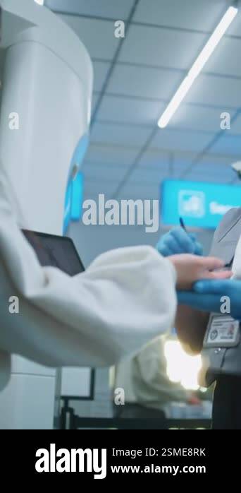 Airport Security Checkpoint: Female Security Officer Doing TSA Hand ...