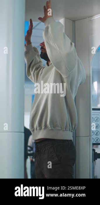 Security Checkpoint in Airport: Adult Man Passing Through Metal ...