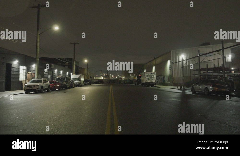 Handheld shot of an empty street in an industrial section of Brooklyn ...