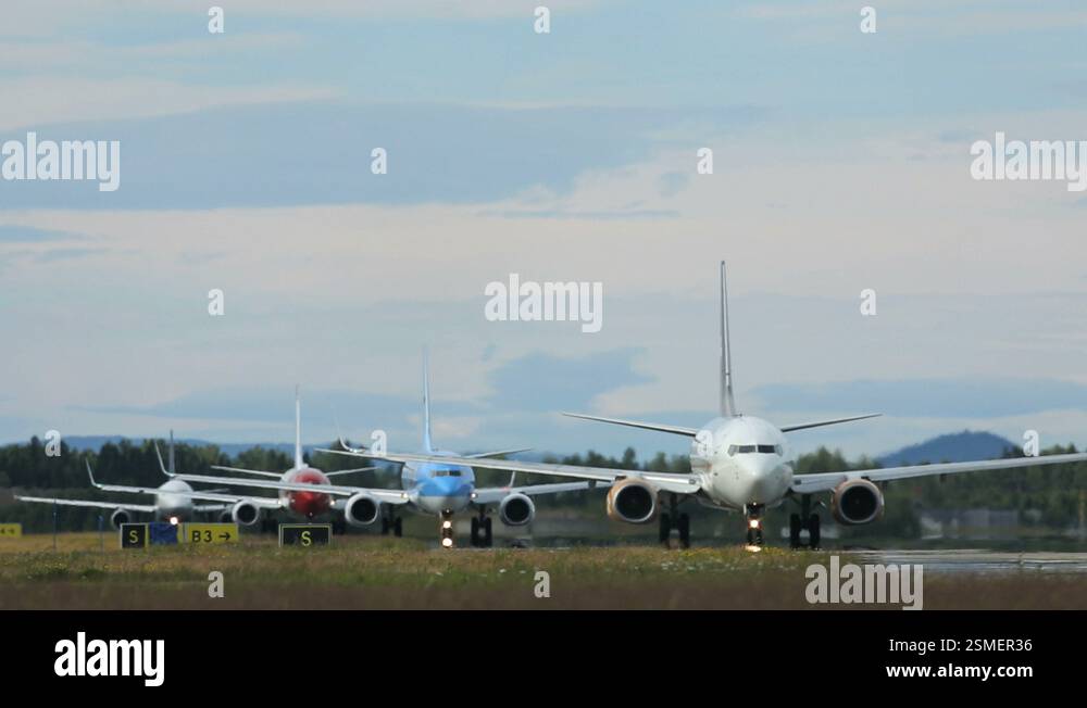 Long row of airplanes taxing at OSL airport Oslo Norway Stock Video ...