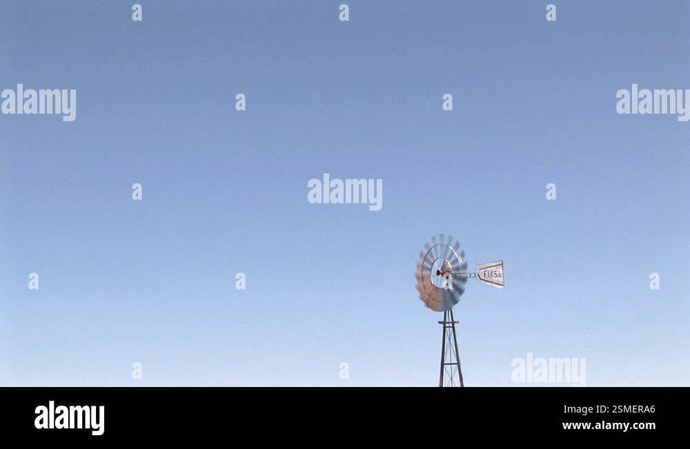 Antique Windmill Spinning in Wind With Copy Space Stock Video Footage ...