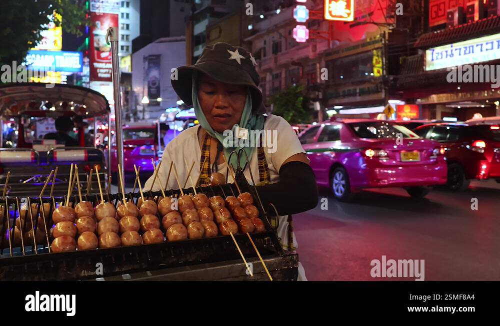 Street food in night market at Yaowarat Road (Chinatown) in Bangkok Stock Video Footage - Alamy