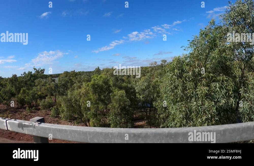 POV of driving trip across Georgina River Bridge in Queensland ...
