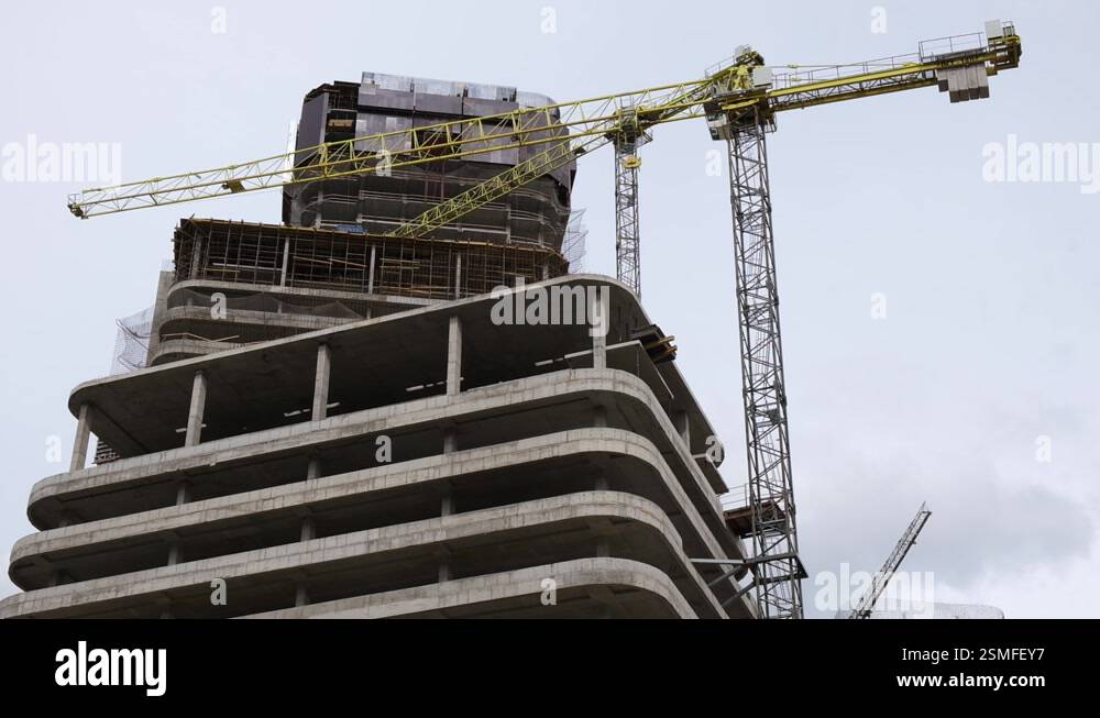 Process of building a multi-storey building at a construction site Stock Video Footage - Alamy