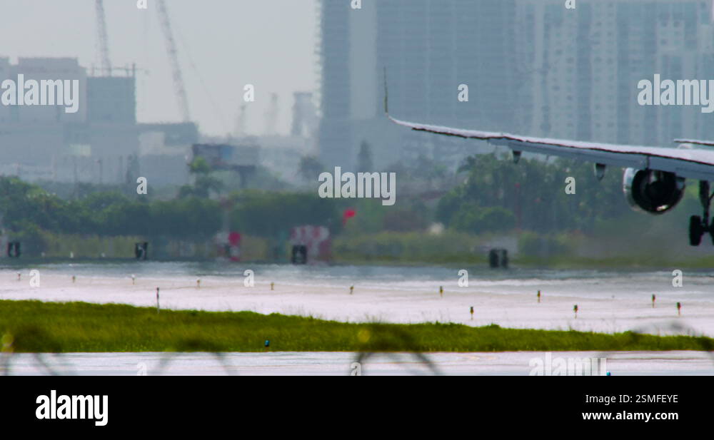 Close-up of Plane Touching Down on Airport Runway Tarmac Stock Video ...