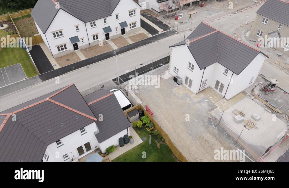Aerial view of heat pump being installed in new build development in ...
