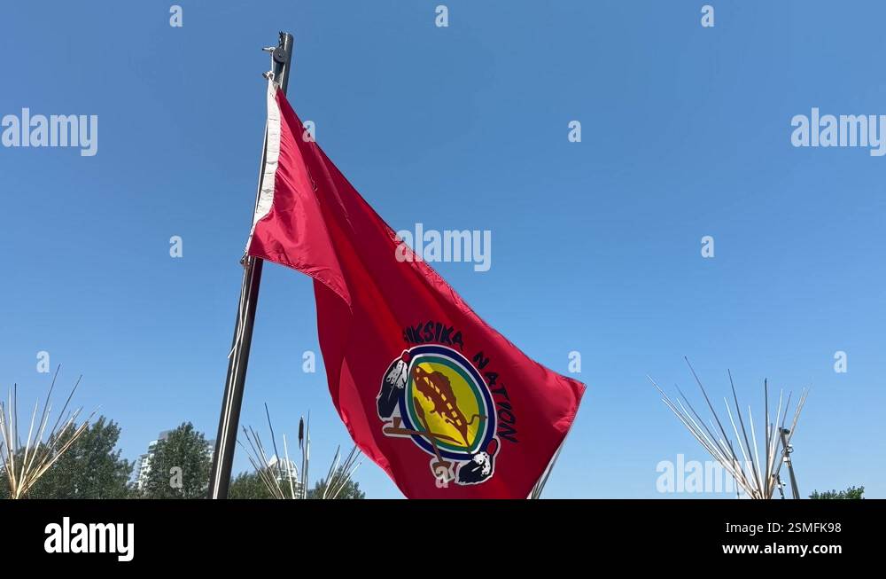 A waving flag of the Siksika Nation, a First Nation in southern Alberta ...