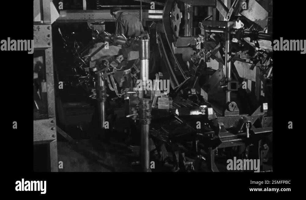 DETROIT 1940s: Workers on an assembly line in a factory Stock Video ...