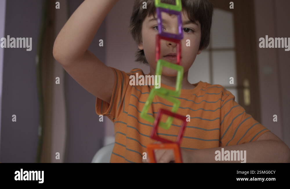 Magnetic Force Demonstration Showing Attraction. Boy Playing With ...