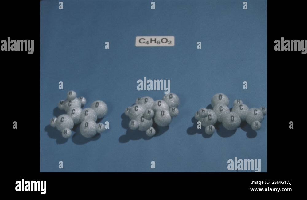 1950s: label with C4H6O2 above three sets of connected styrofoam balls ...
