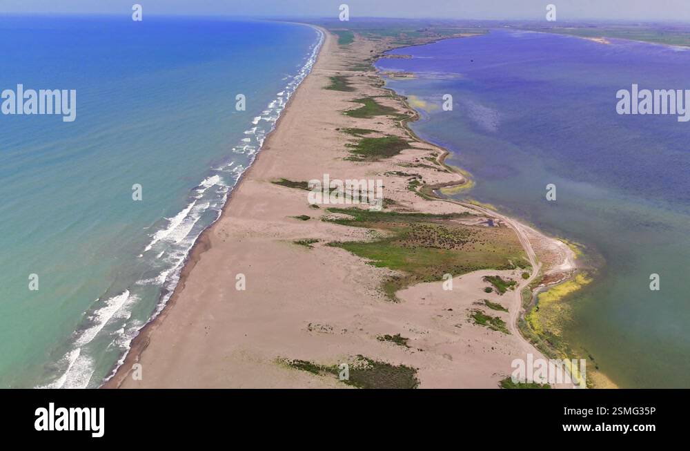 Drone footage captures the beauty of The Spit, a narrow strip of land ...