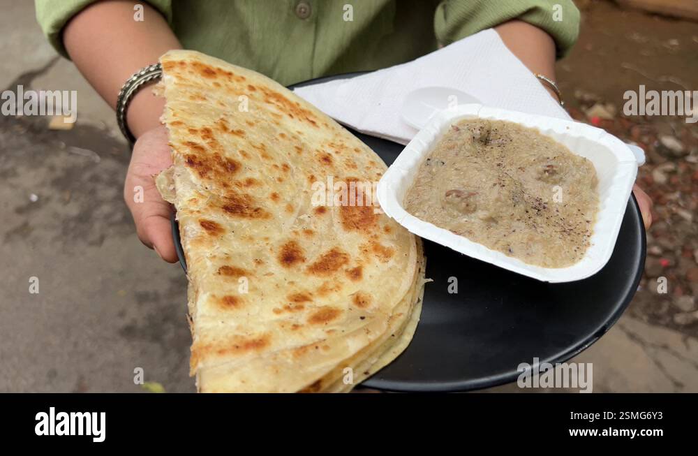 Lachha paratha served with mutton Rezala in India Stock Video Footage ...