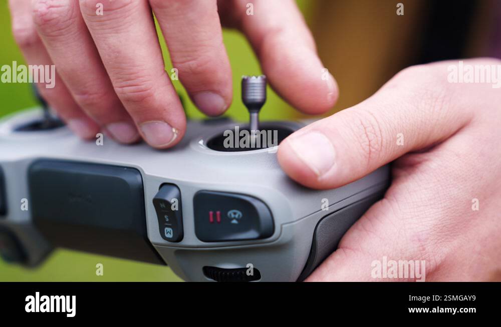 Close up of drone pilot screw joystick on remote control unit, Czechia ...