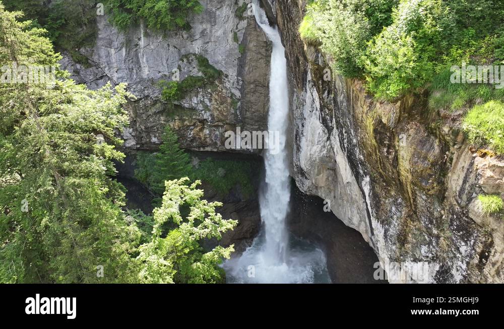 Bird's-eye view of the stunning Berglistüber Waterfall in the Swiss ...