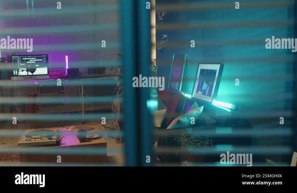 View through Blinded Window of Modern Home Recording Studio with Neon ...