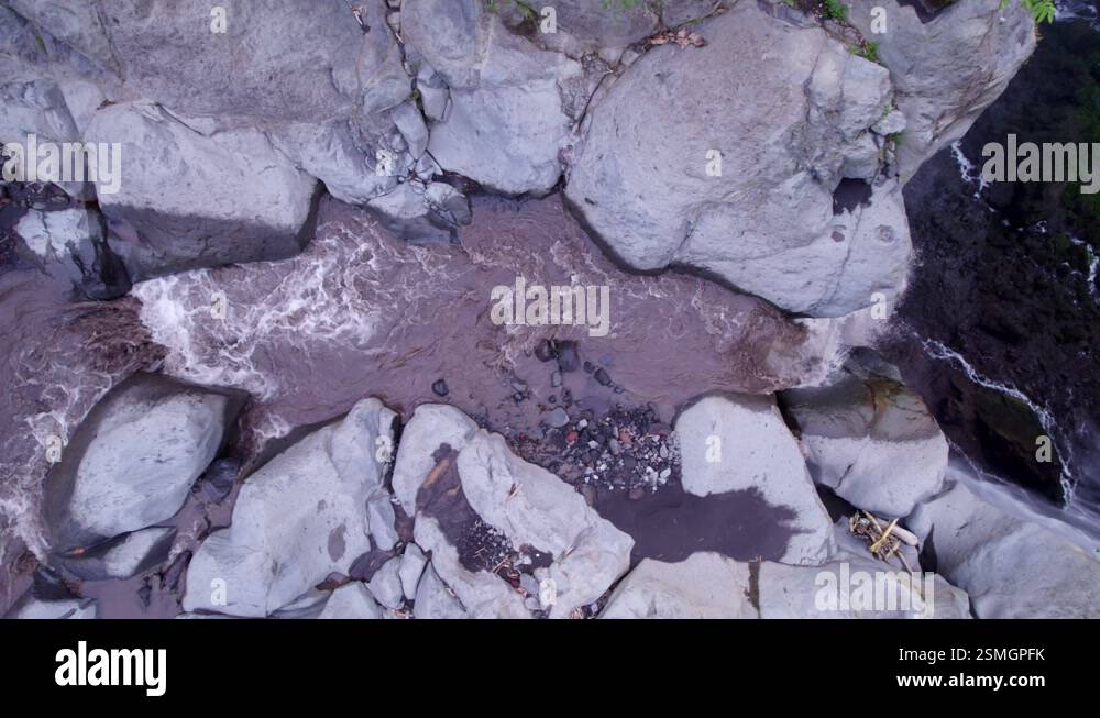 Aerial view of waterfall, river, rocks, cliff, Tumpak Sewu, Indonesia ...
