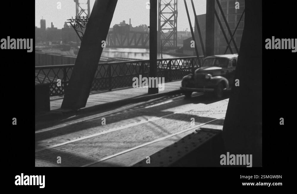 1940s: Film footage from the 1940s shows a bridge in a city setting ...