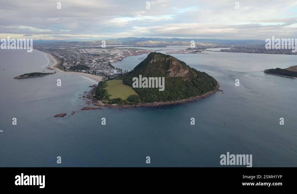 Mauao Mountain (Mount Maunganui) And Tauranga Harbour At Sunset In Bay ...
