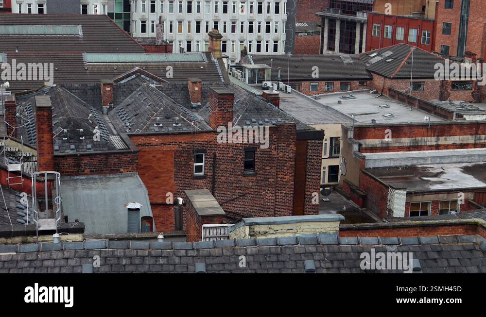 Buildings With Old Rooftops And Chimneys In Central Manchester, UK ...