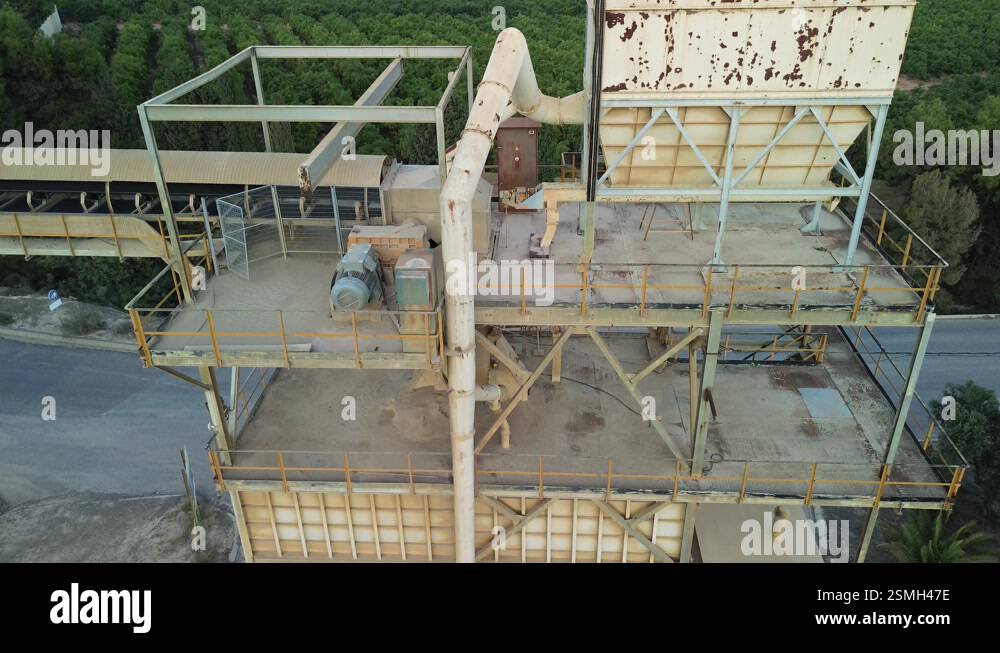 Aerial view of an industrial structure with rust, conveyor belts and ...