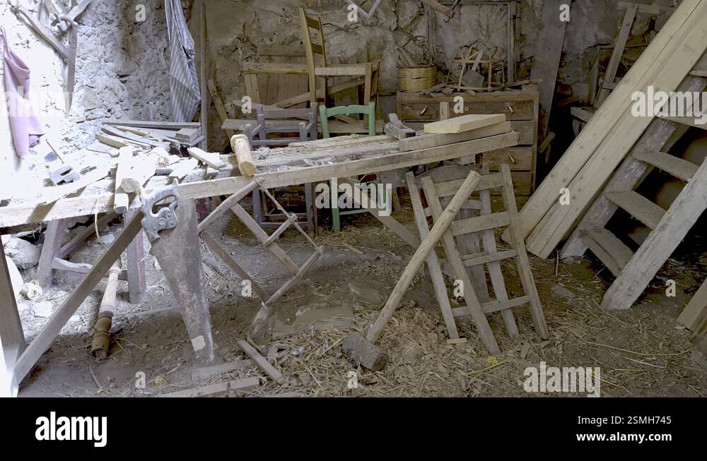 Messy carpenter workplace at Grotta Mangiapane rural village in Sicily ...