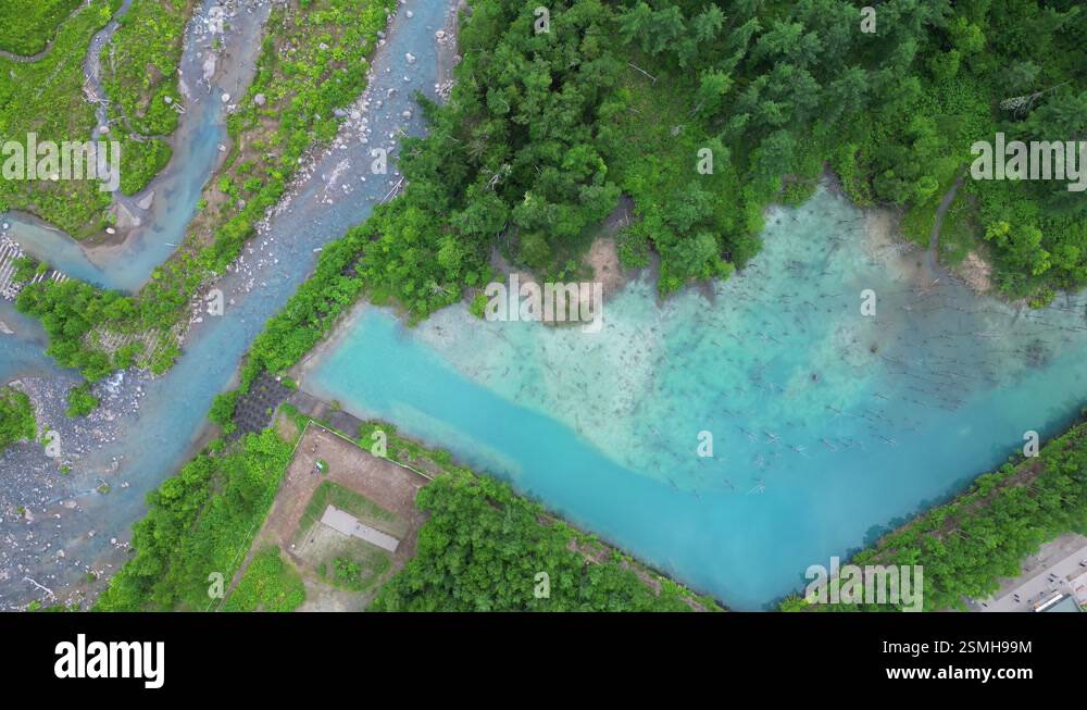 Aerial of Shirogane Blue Pond near Asahikawa in Hokkaido Stock Video ...